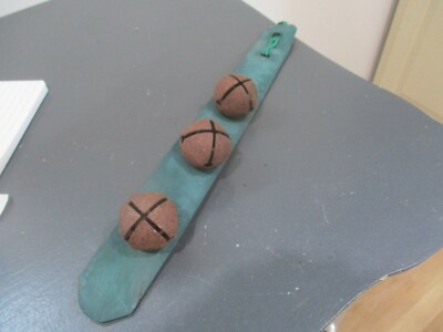 3 Rusty bells on a green leather strap. | eBay