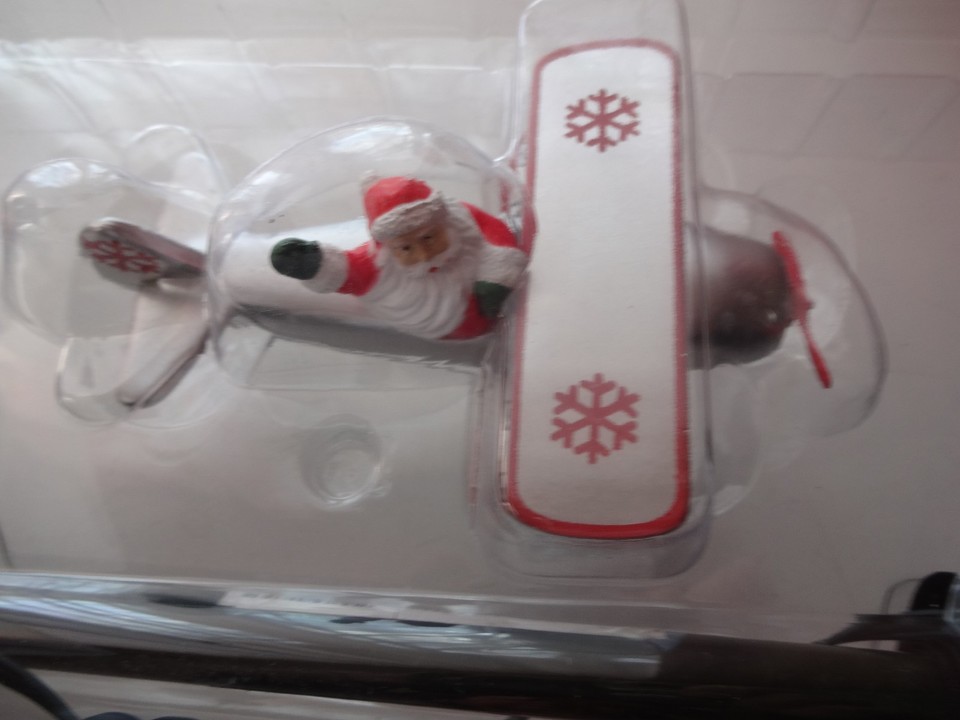 Mr. Christmas Animated Tree Topper Santa's Airplane Circles Tree ...