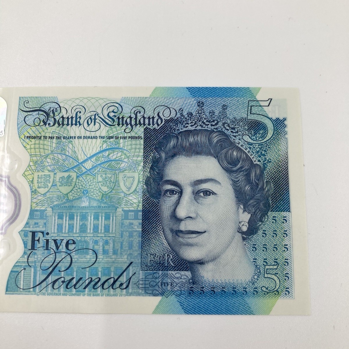 New Plastic Five Pound Note British Money On White First Look At The