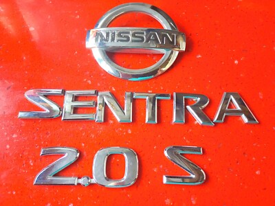 07 08 09 10 11 12 NISSAN SENTRA 2.0 S REAR LID EMBLEM LOGO BADGE SIGN ...