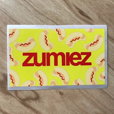 ZUMIEZ LOGO STICKER 3.25”x 2” DECAL HOTDOG YELLOW RECTANGLE SKATE SURF ...