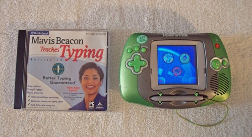LEAPSTER LEARNING SYSTEM WITH BUILT IN PROGRAMS, AND USES CARTRIDGES ...