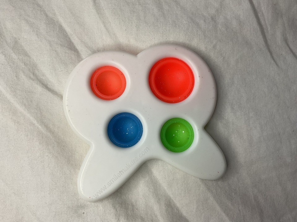 Simple Dimple Tooth Fidget Popper | eBay