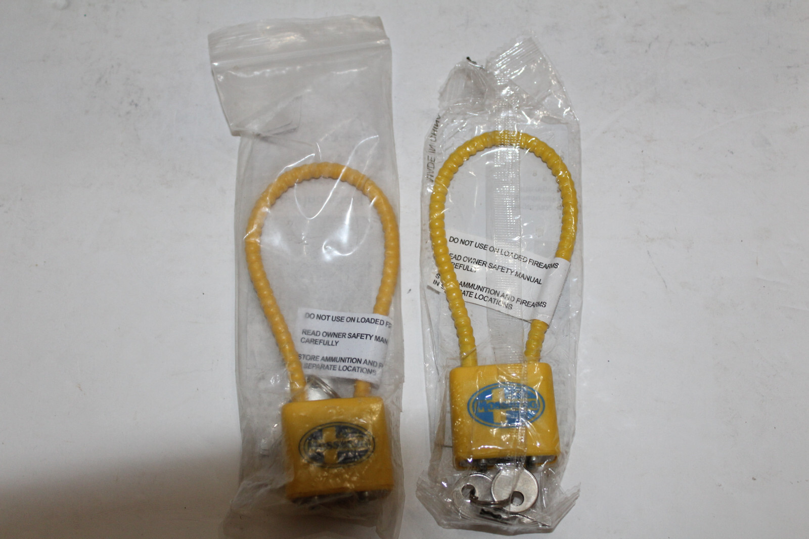 Lot of TWO Yellow Mossberg Cable Gun Locks | eBay