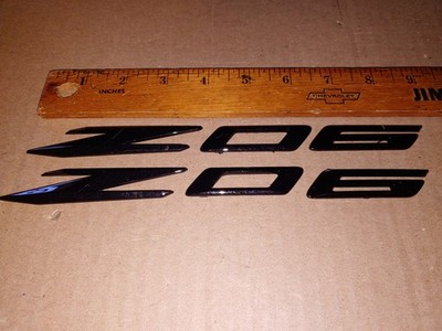 2026 Chevrolet Corvette ZO6 Left & Right Emblems Carbon Flash Genuine ...