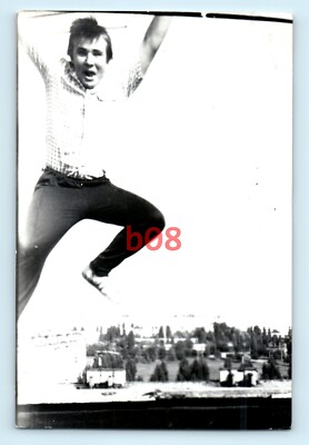 Handsome young man Jump Affectionate Abstract Weird Out of frame hand ...