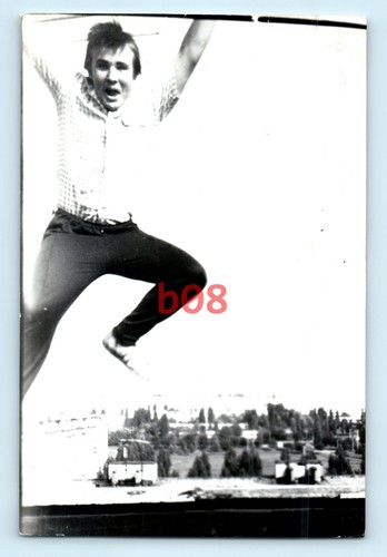 Handsome young man Jump Affectionate Abstract Weird Out of frame hand ...