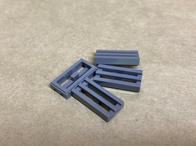 LEGO Dark Bluish Gray Tile Modified 1 x 2 Grille with Bottom Groove ...