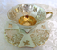 ALKA White and Gold Rose Filigree Wide Mouth Tea Cup & Saucer W ...