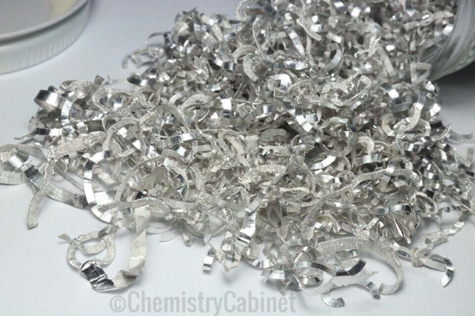 Jar of magnesium metal turnings 99.95% pure element 12 mg chemistry ...