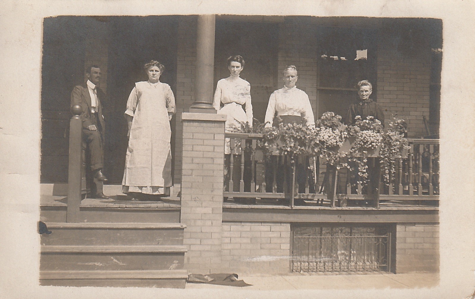 1910 postcard: family on porch; mailed to Susan Shoop, Carsonville, PA ...