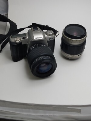 Pentax ZX-50 35mm SLR with 35-80mm F4-5.6 Lens AND Promaster 28-80mm 1: ...
