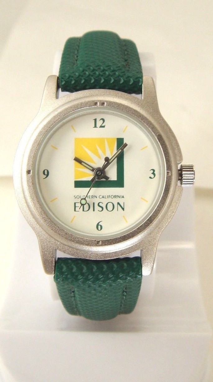 COLLECTIBLE EDISON WOMAN'S ANALOG WITH PLATED EDISON DIAL & GREEN ...