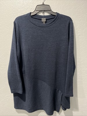 Clara Sun Woo Sweater with an asymmetrical design at the bottom, light ...