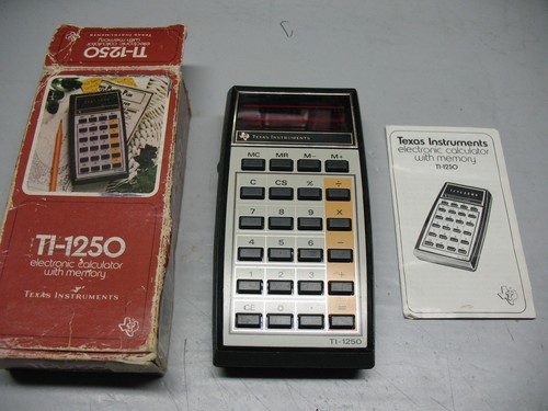 TEXAS INSTRUMENTS ELCTRONIC CALCULATOR w/ MEMORY TI -1250 COMPLETE NICE ...