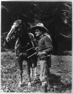 Photo:Tom Mix,1919,2 guns drawn,beside horse,Rough Riding Romance ...