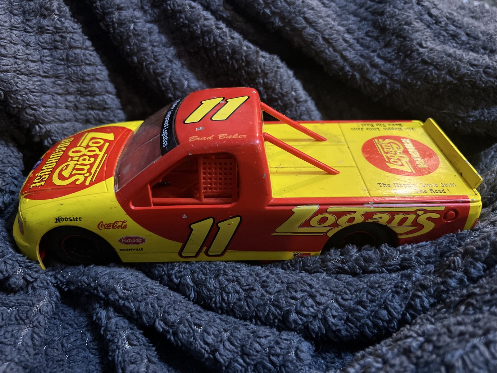 Brad Baker #11 Logans Roadhouse 1/24 SCALE NASCAR Truck by racing champions B200 | eBay