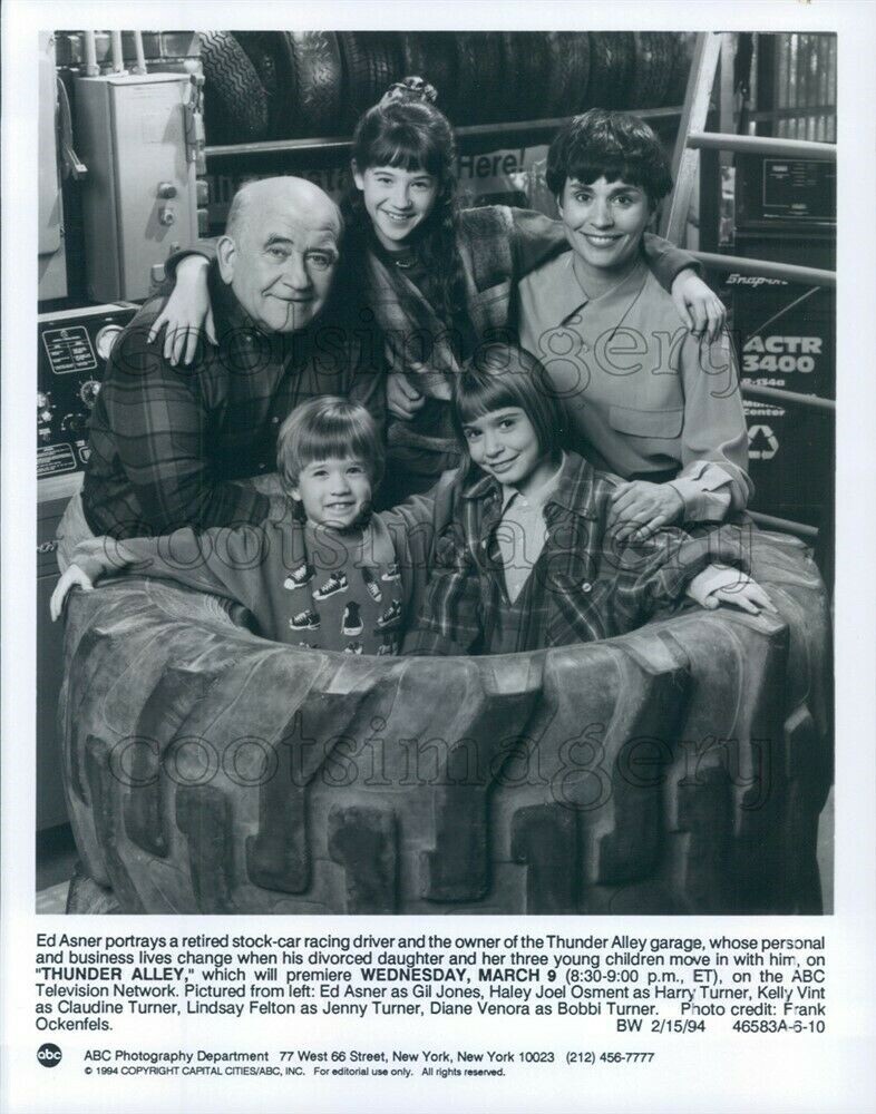 1994 Press Photo Primary Cast of Thunder Alley TV Show in Big Tire | eBay