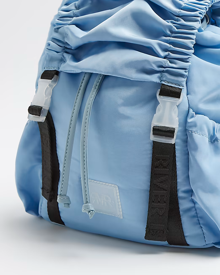 RIVER ISLAND small BLUE RI RUCHED NYLON BACKPACK with side pockets NEW ...