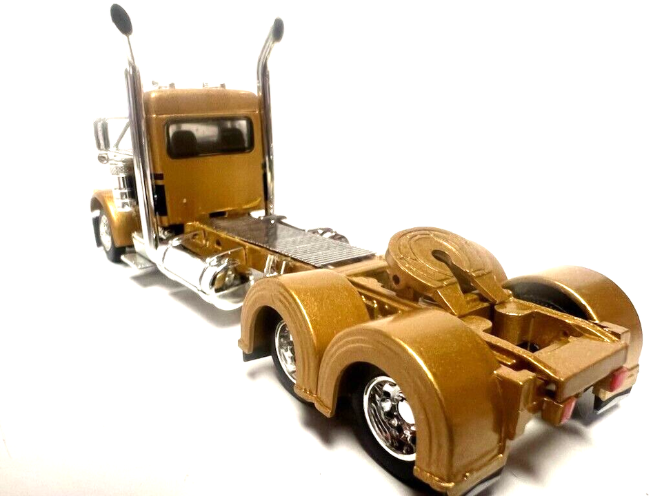 DCP FIRST GEAR 1/64 SCALE 379 PETERBILT DAY CAB, GOLD WITH BLACK STRIPE ...