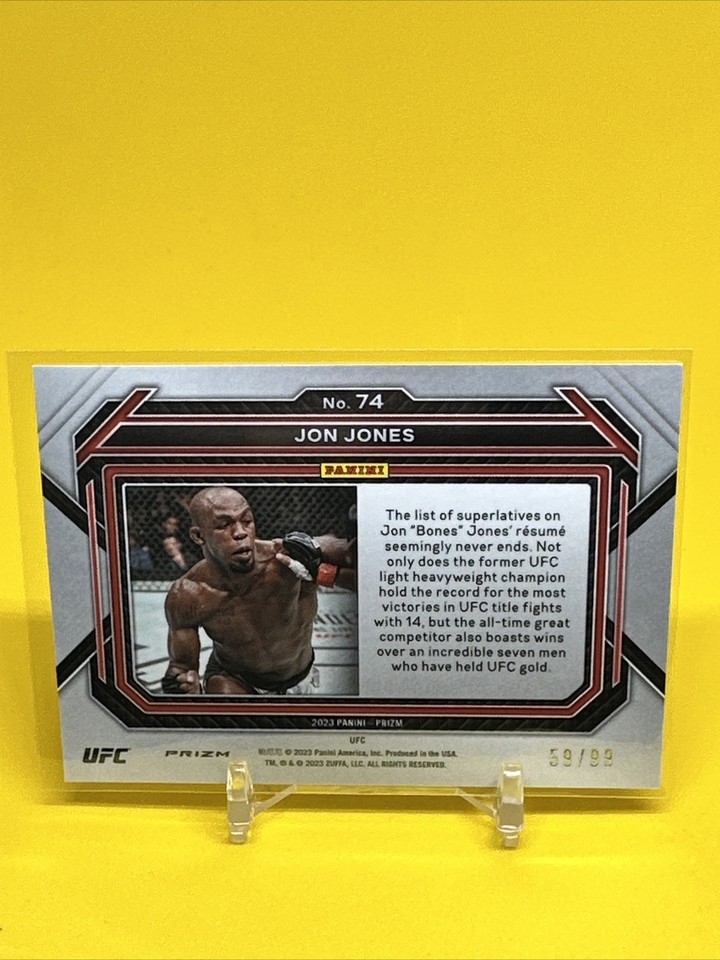 2023 Panini Prizm UFC Orange Prizm 59/99 Jon Jones #74 Fighter Of The ...