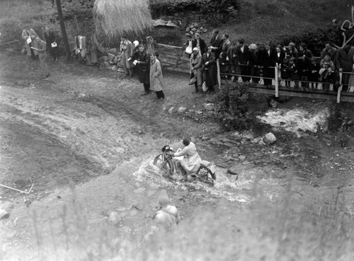Marjorie Cottle, Triumph, rides through a river 1938 Motor Racing Old ...