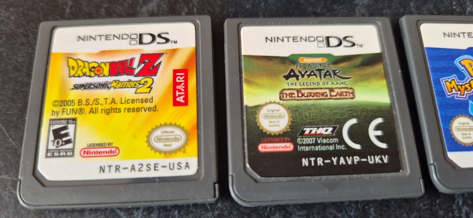 4x nintendo ds games & holder pokemon dragon ball z avatar monster ...