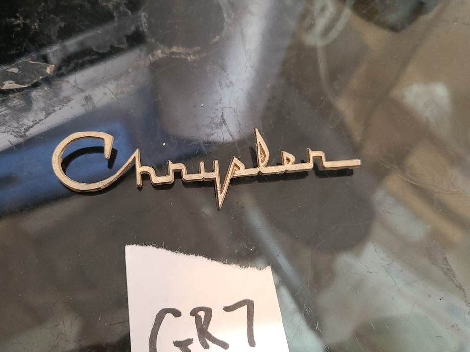 1957 58 CHRYSLER WINDSOR DASH / GLOVE BOX EMBLEM OEM MOPAR ...BIN GR7 ...