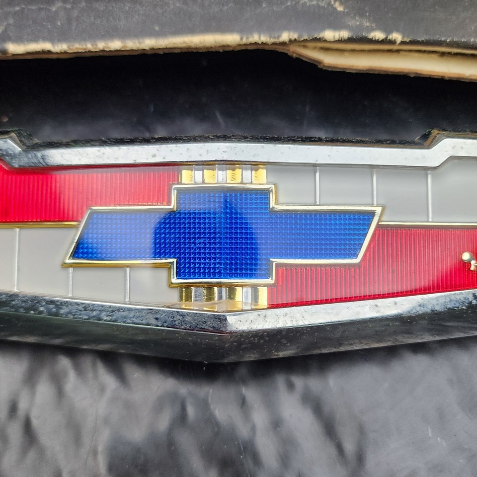 1956-58 Chevy Bel Air Impala NOS V8 Hood Emblem Crest 3721309 📦 | eBay