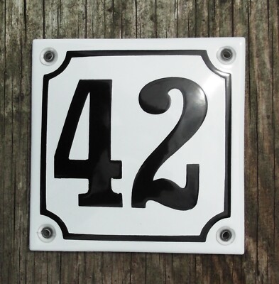 HOUSE NUMBER 42, CLASSIC ENAMEL SIGN. BLACK No.42 ON A WHITE BACKGROUND ...