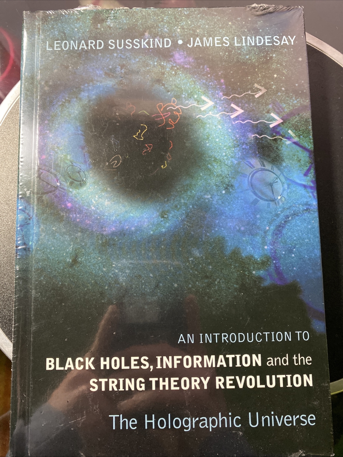 Introduction to Black Holes, Information and the String Theory Revolution : The Holographic ...
