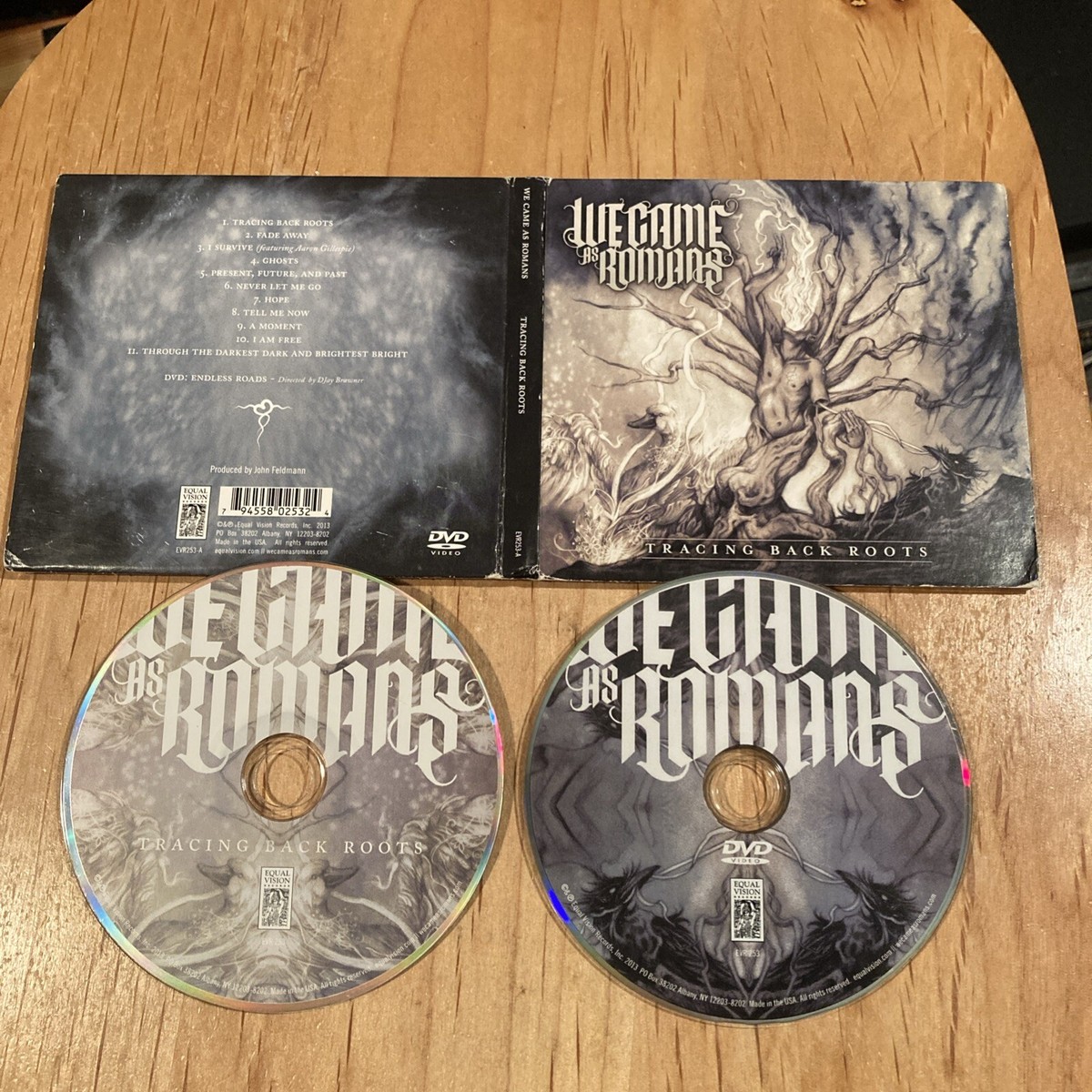 We Came As Romans Tracing Back Roots Album Cover WE CAME AS ROMANS