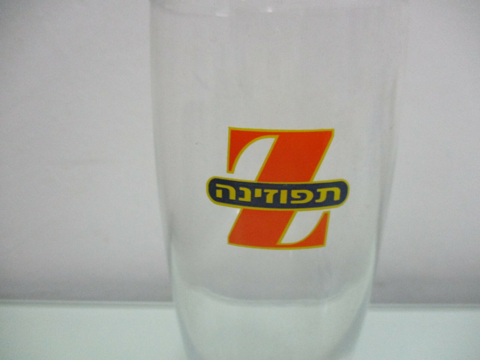 Tapuzina - an orange flavor juice : an advertising drinking glass ...