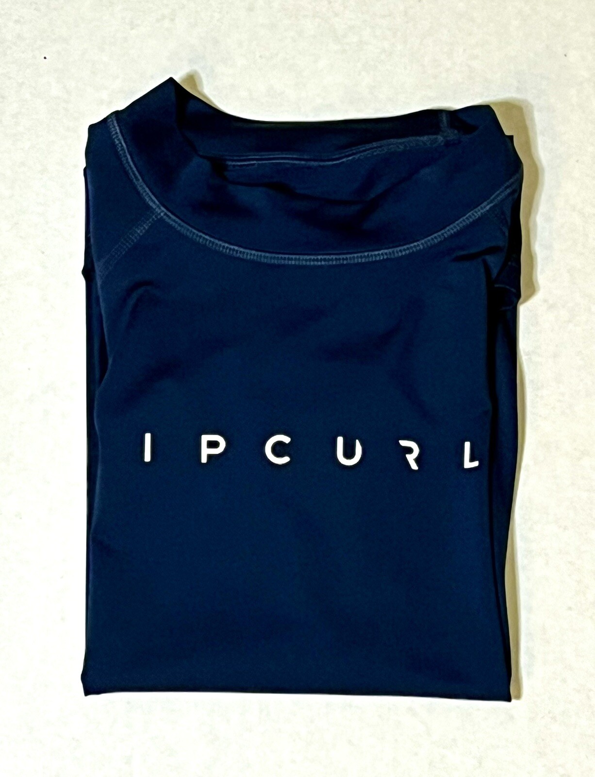 RIP CURL RASH NAVY UPF50+ SUN PROTECTION TOP T SHIRT - Gem