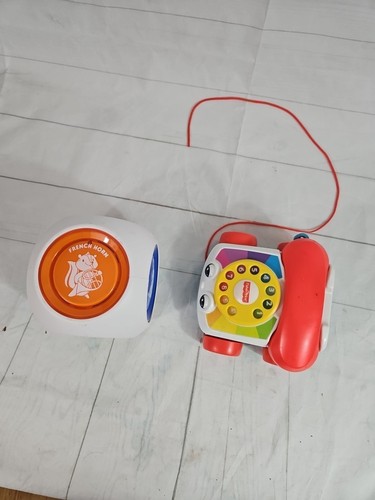 Munchkin Mozart Magic Cube Orchestra And Fisher Price Pull Toy Phone ...