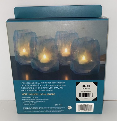 Glowing LED Lanterns With Floating Flameless LED Candles Luminaries ...