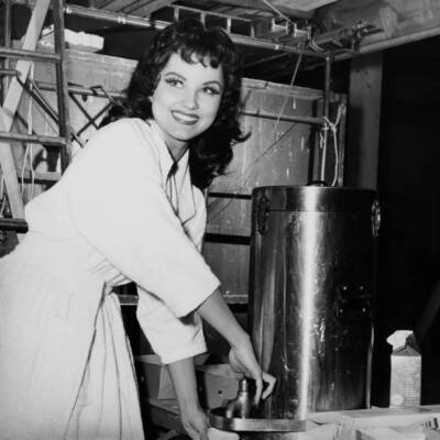 American Actress Debra Paget Helps Herself To Coffee On The Set Of Old ...
