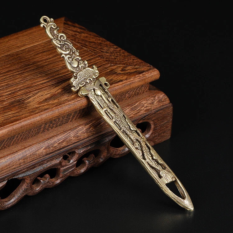 Small Asain Golden Dagger With Animal On It