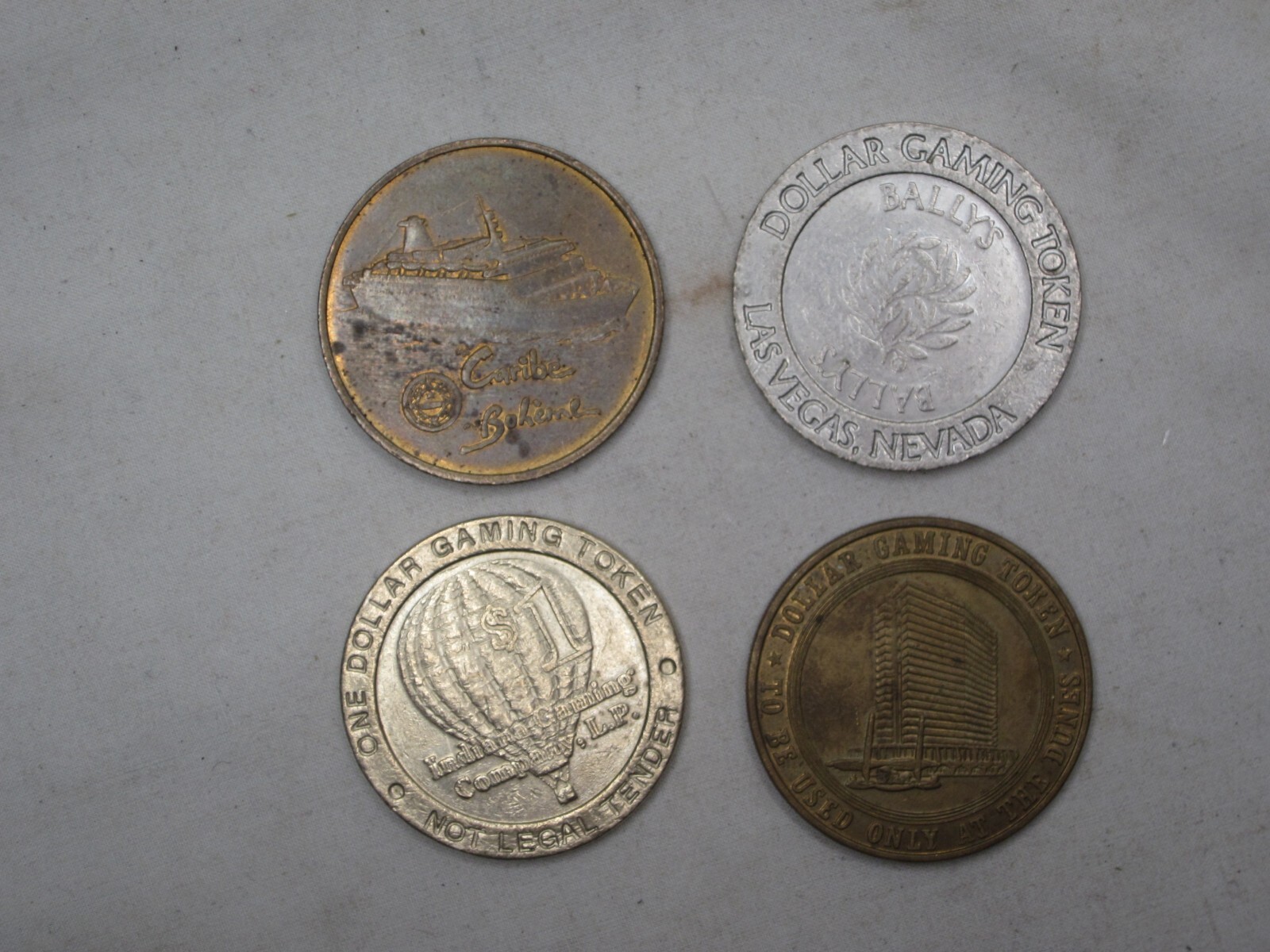 4 vintage Casino Gaming Tokens DUNES BALLYS LAS VEGAS INDIANA CARIBE ...