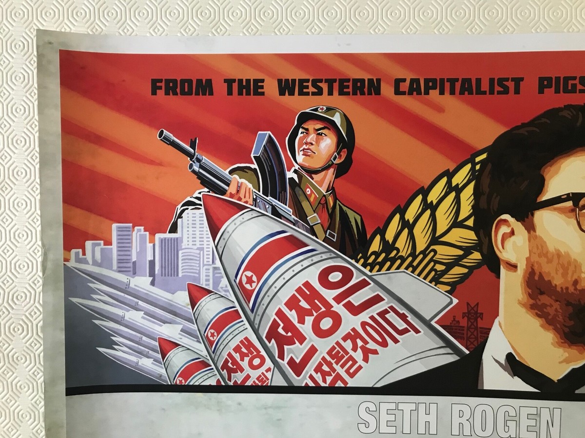 Seth Rogen The Interview Poster Moviegoer Tim Stone Waits By A Poster