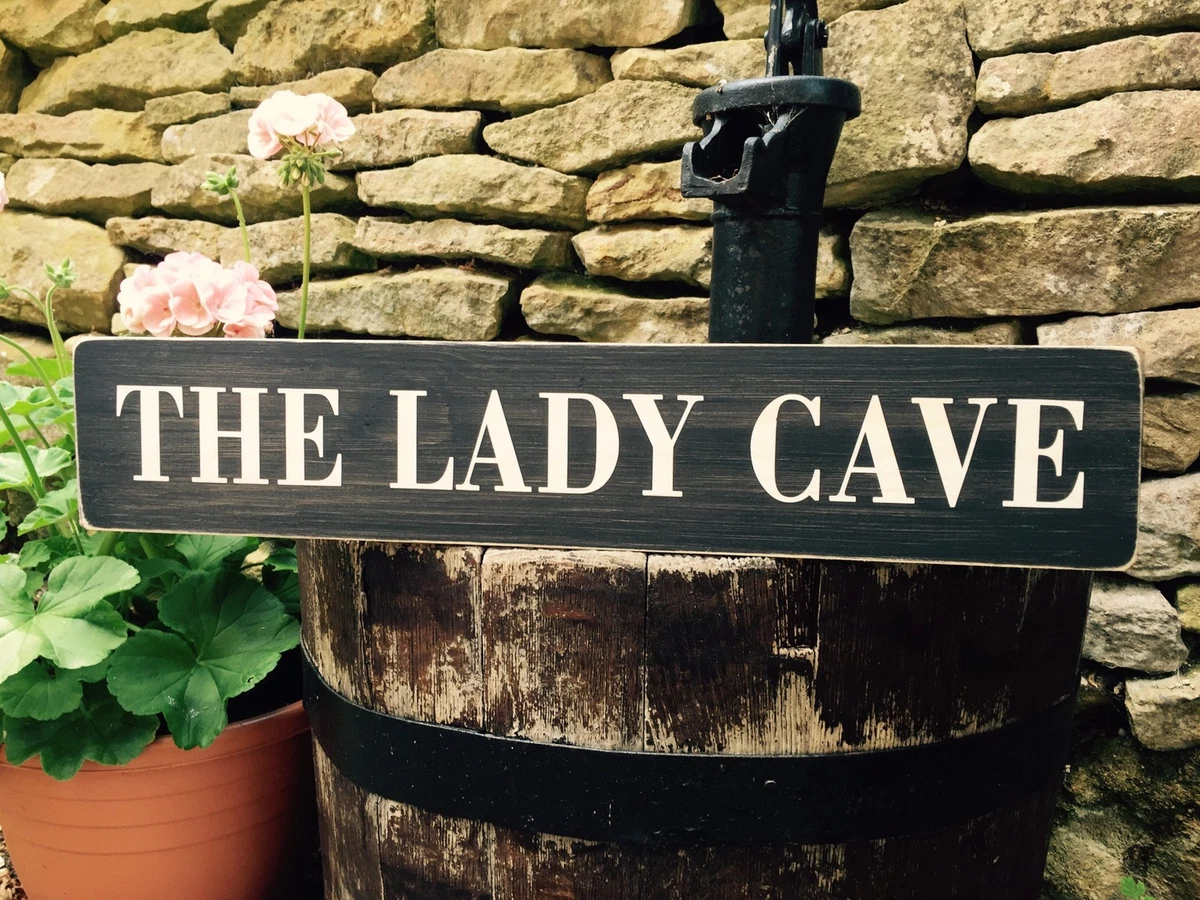 Female Cave Sign