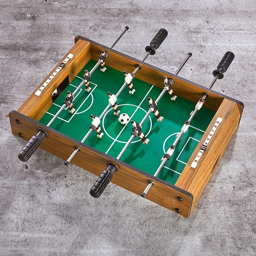 Family Playing Foosball