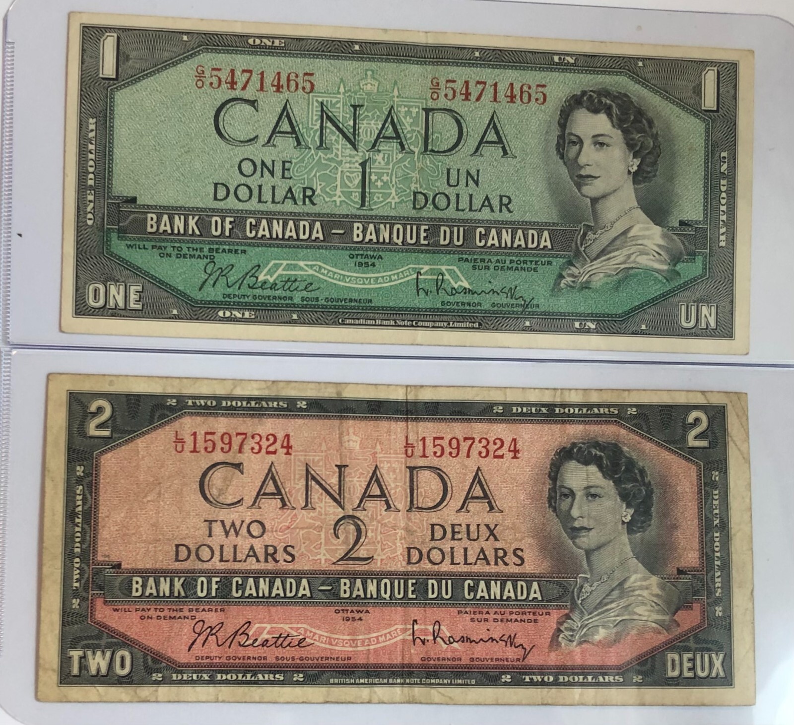 1954 - ONE AND TWO DOLLAR CANADA BANK NOTES SET IN PLASTIC NOTE HOLDERS ...
