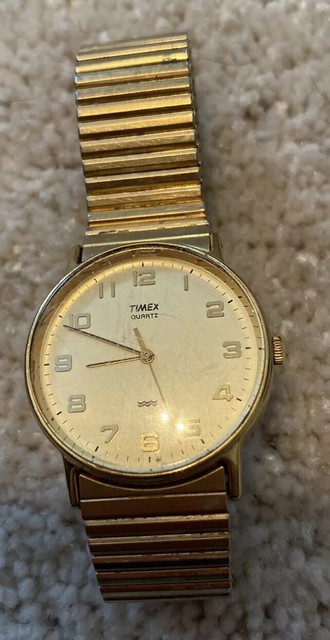 Vintage Timex Men's Gold Tone Quartz Watch LA Cell Water Resistant | eBay