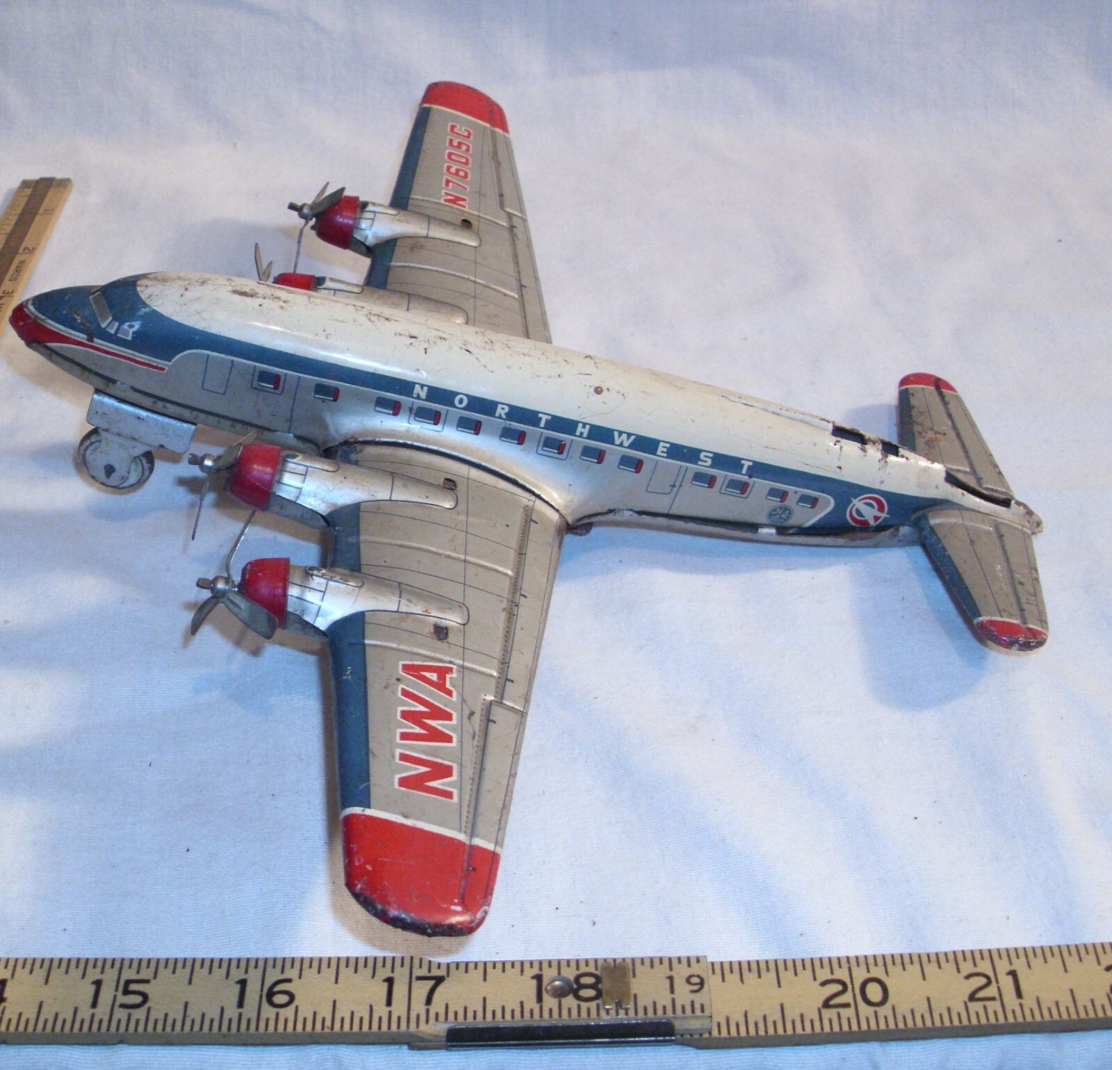 NORTHWEST AIRLINES 4 ENGINE AIRPLANE TIN TOY JAPAN FOR PARTS OR TO ...