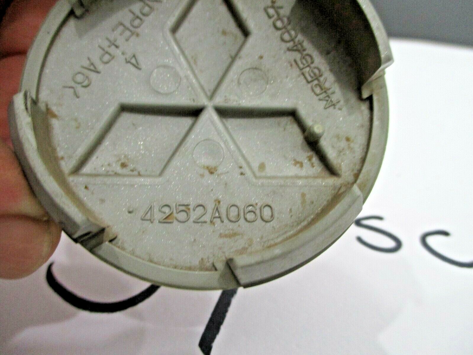 Mitsubishi Lancer 4252A060 Hub Cap Center Small Cap used #131-SC | eBay