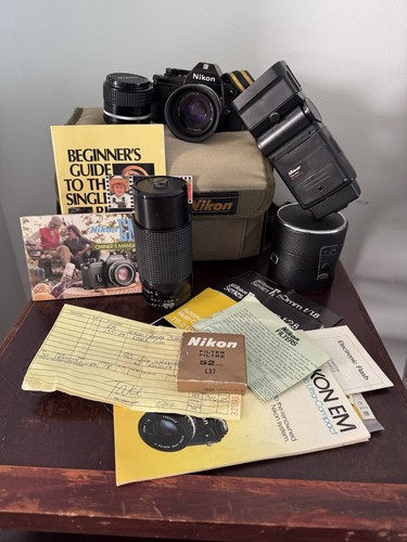 Nikon EM SLR Film Camera Black with 2 Series E Lens, Closeup Lens and more | eBay