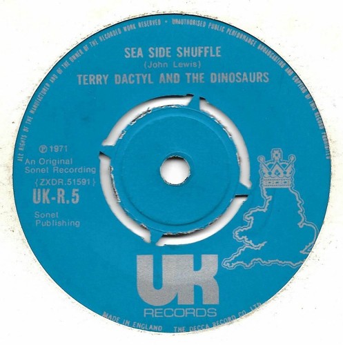 SP 45 RPM (7") Terry Dactyl and The Dinosaurs " Sea side shuffle ...