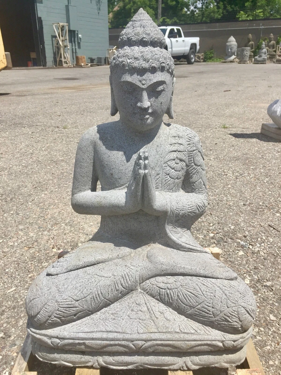 Japanese Stone Statues In Landscape