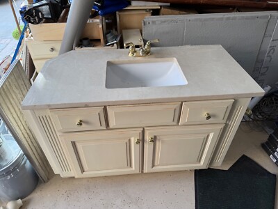 good condition wellborn vanity with Marble counter top sink and delta ...